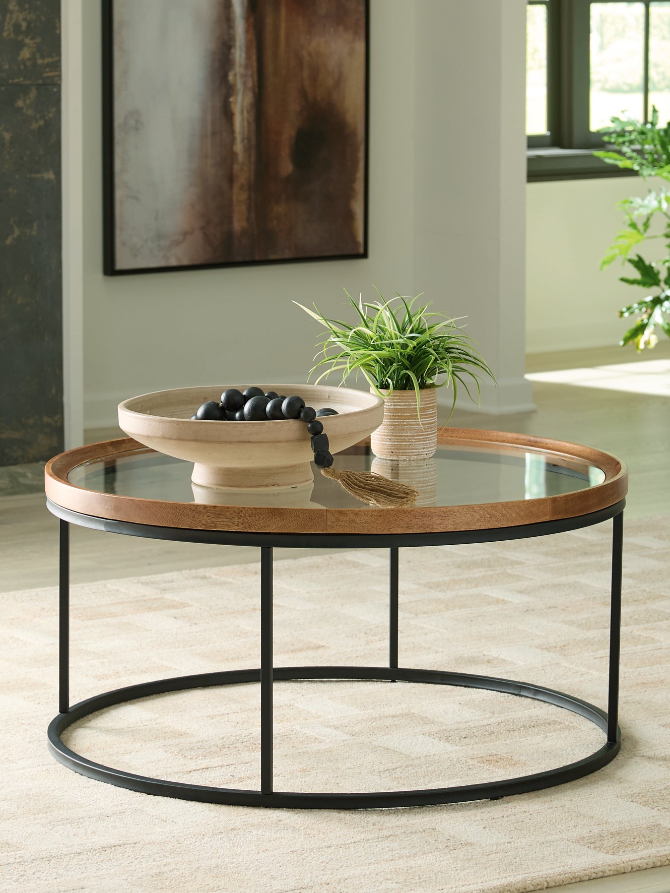 Noraluna Round Cocktail Table – University Furniture Gallery
